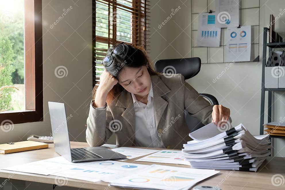 Asian Business Woman Stressed Office Worker Overloaded with Paperwork ... Asian Business Woman Stressed Office Worker Overloaded with Paperwork ...
