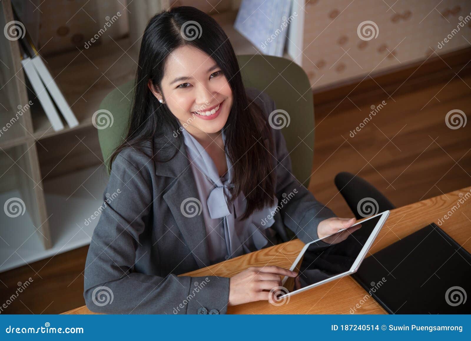 Asian Business Woman Using Tablet Computer at Home Office Stock Photo ...