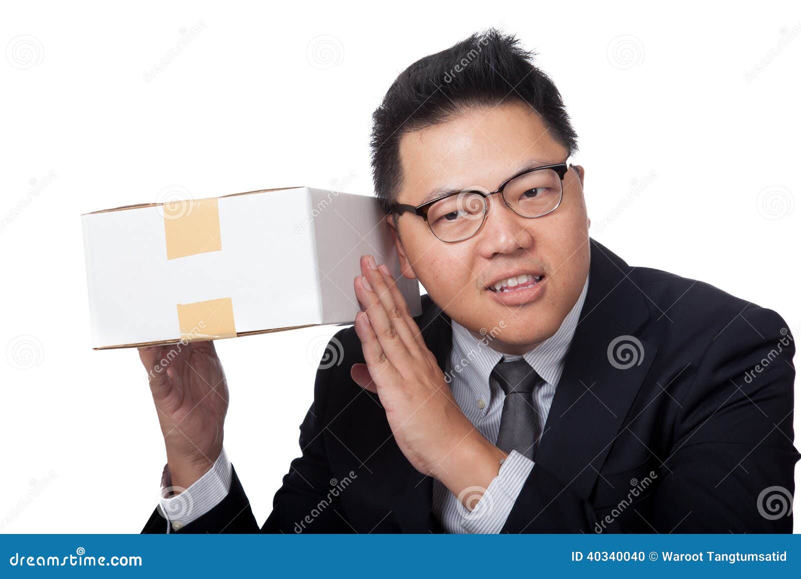 Asian Businessman is Curious What Inside a Box and Smiling Stock Photo ...