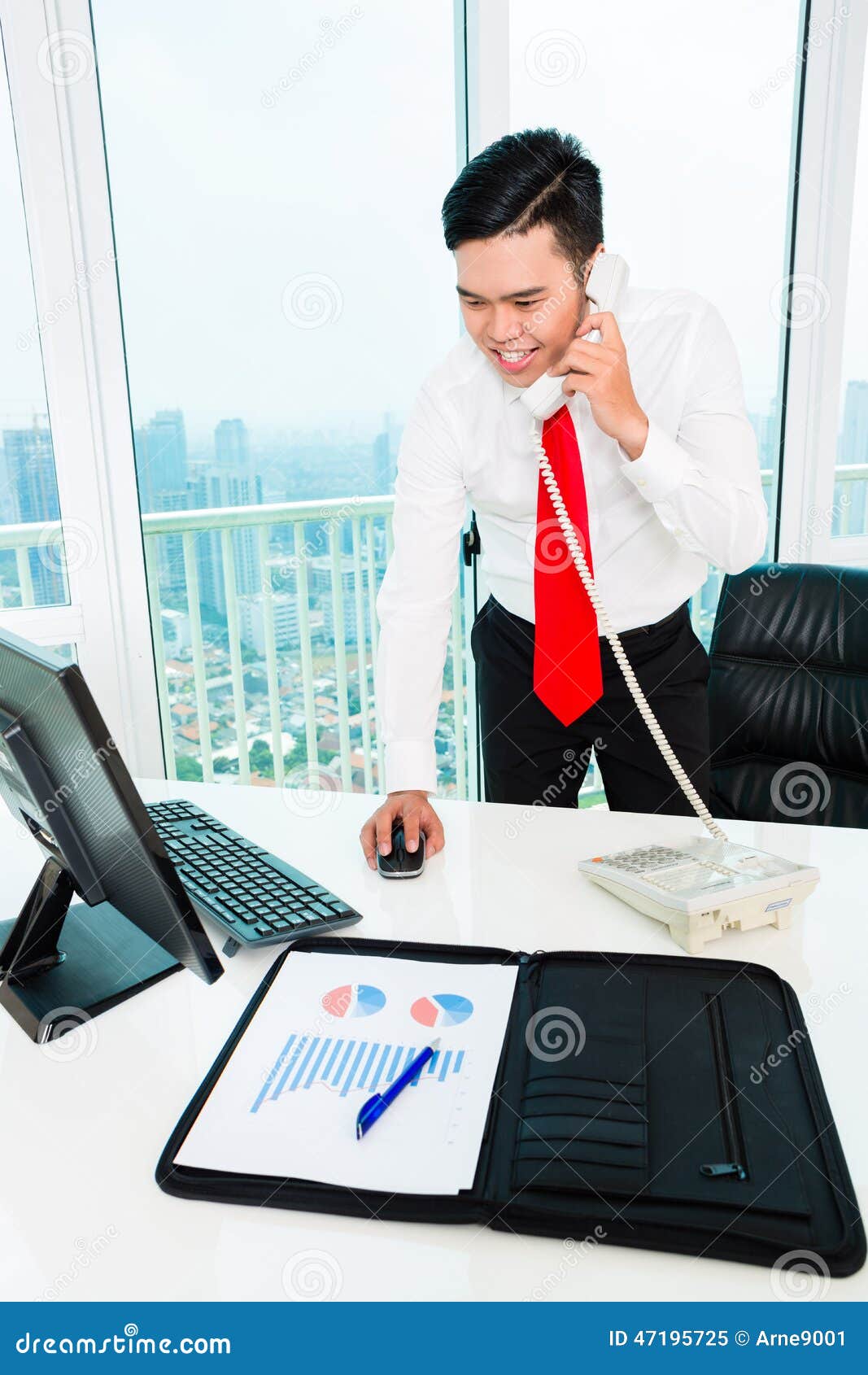 Asian Businessman on Phone Working in Office Stock Image - Image of ...