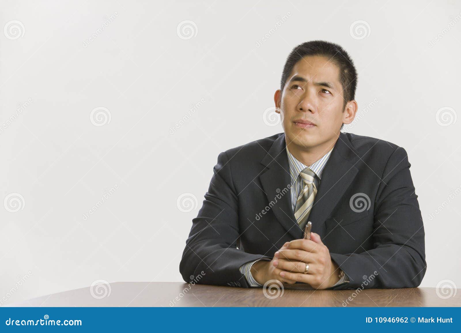 Asian businessman thinking stock photo. Image of confidence - 10946962