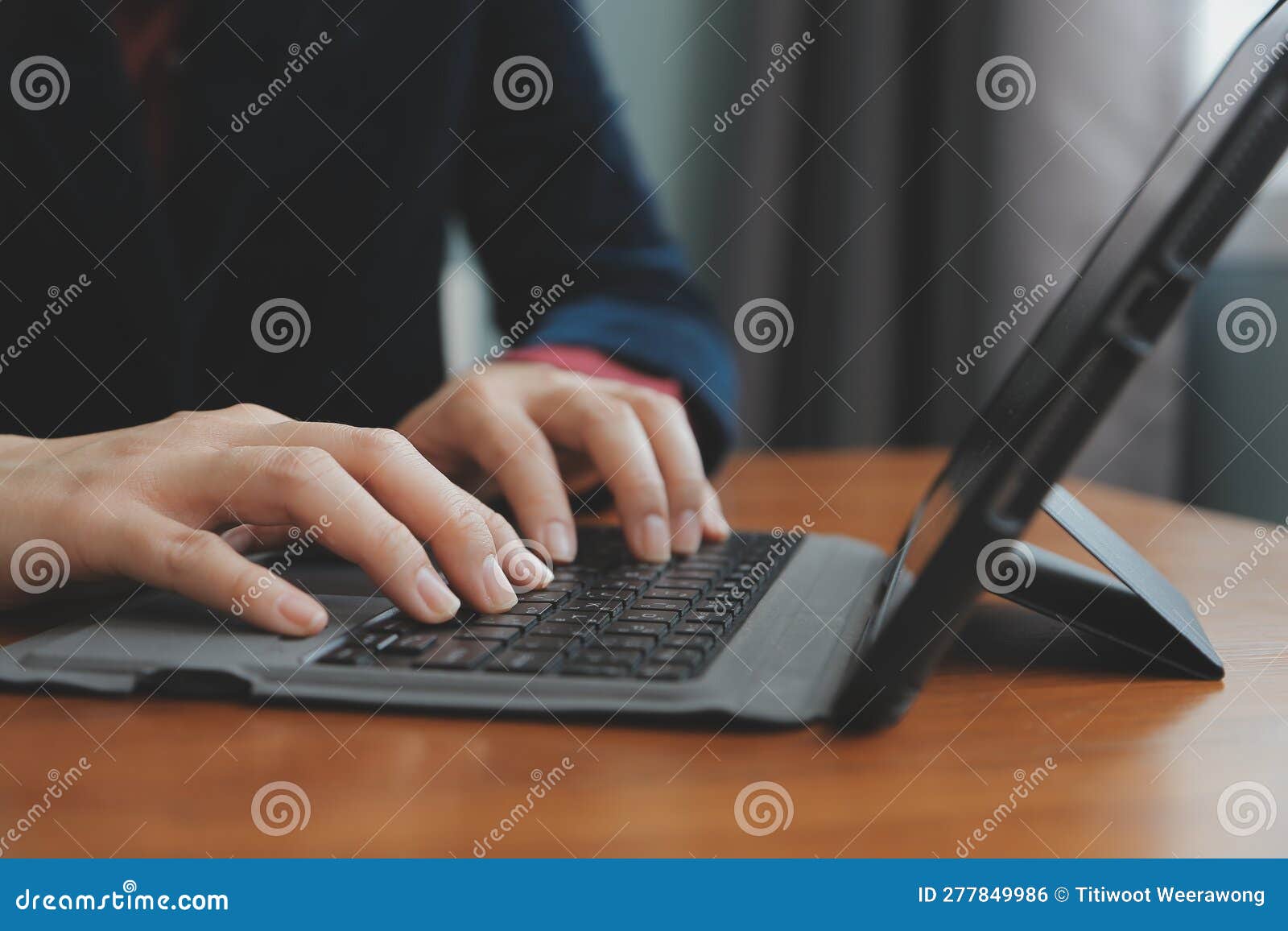 Asian Businesswoman Using Laptop Computer and Working at Office with ...