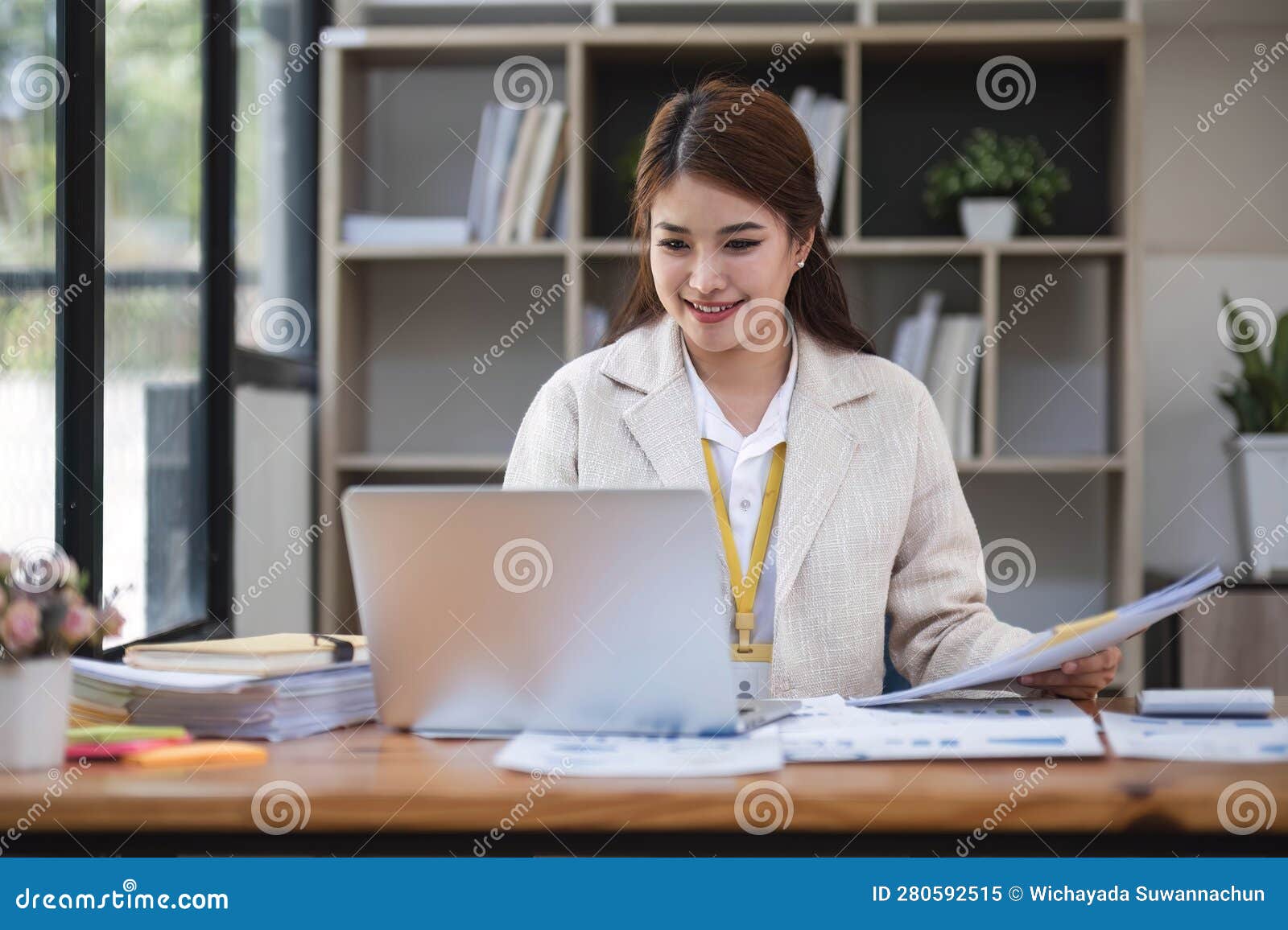 Asian Businesswoman Using Laptop Computer and Working at Office with ...