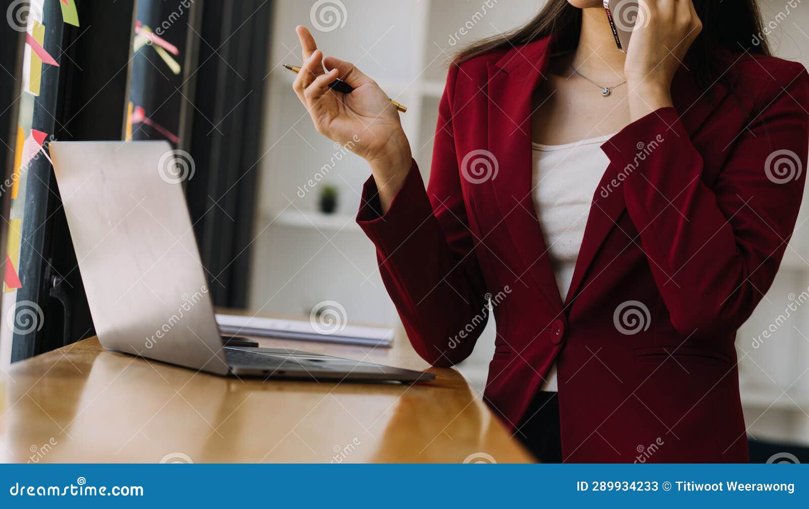 Asian Businesswoman Using Laptop Computer and Working at Office with ...