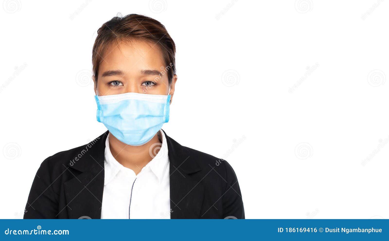 Asian Businesswoman Wearing Surgical Face Mask In Formal Black Suit