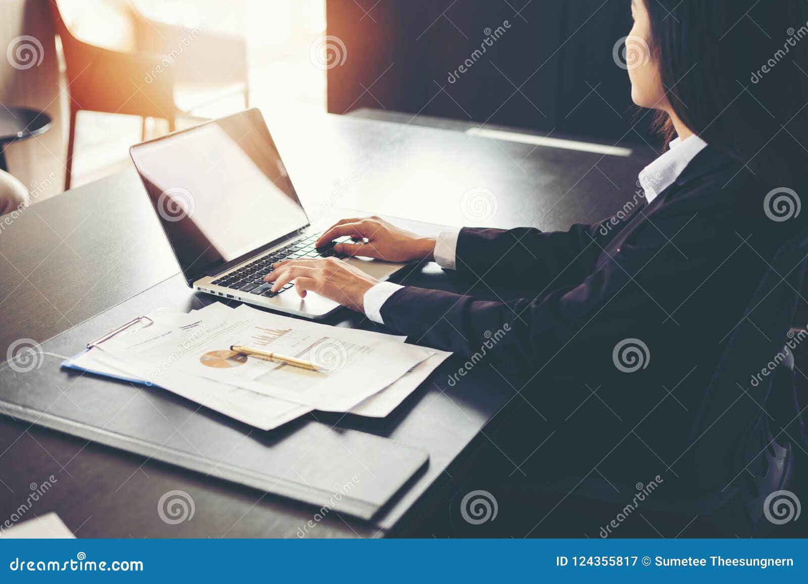 Asian Businesswomen Using Laptop Computer Analysis Documents an Stock ...