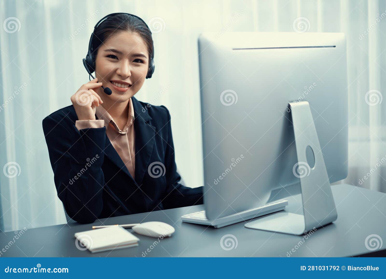 Enthusiastic Asian Call Center with Headset on Her Workplace Portrait ...