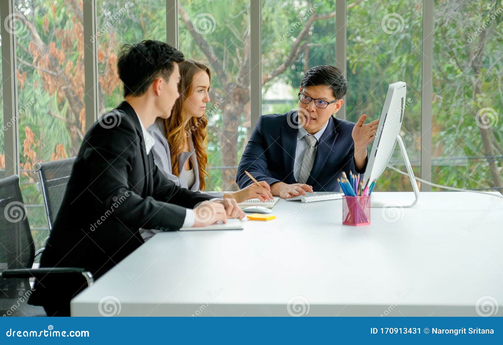 Asian Chief or Manager Explain Bout the Project To His Team for Planing ...