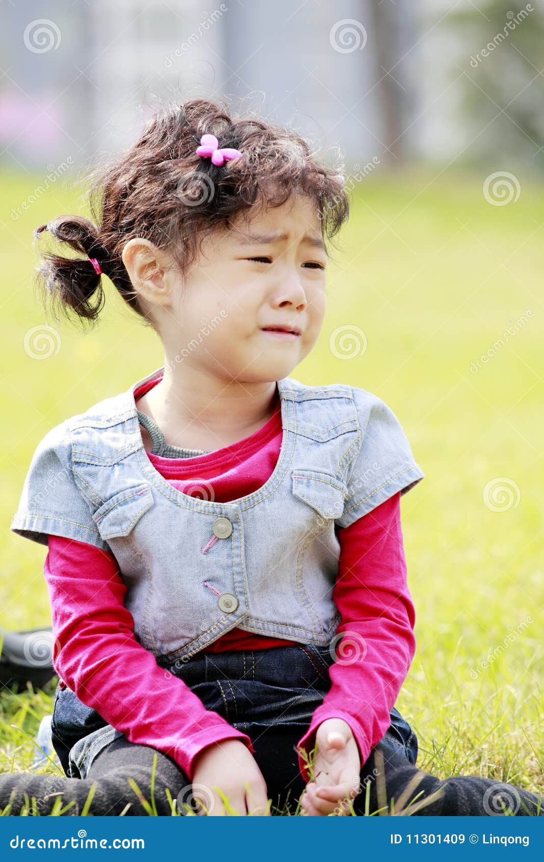 Asian child crying stock image. Image of grass, holding - 11301409