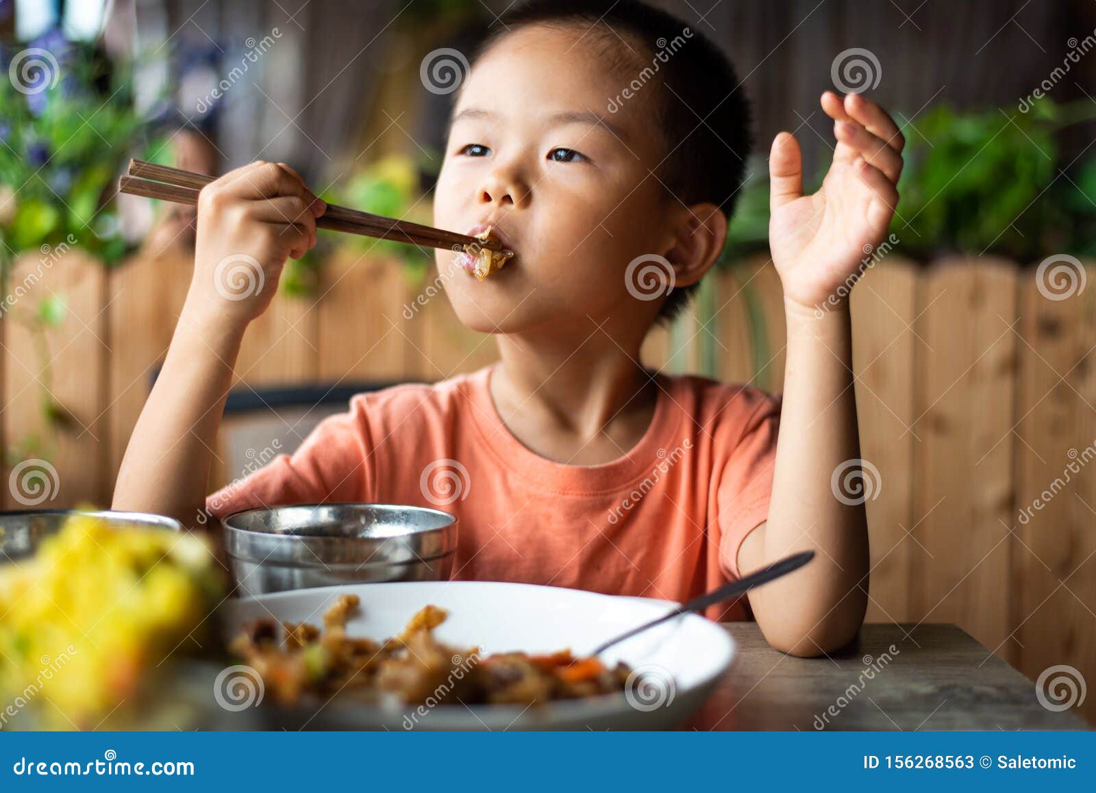 Asian Child Having Lunch at the Restaurant Stock Image - Image of asian ...
