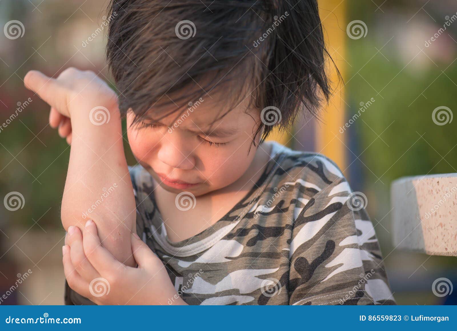 Asian Child Injured at Elbow Stock Image - Image of skin, injury: 86559823
