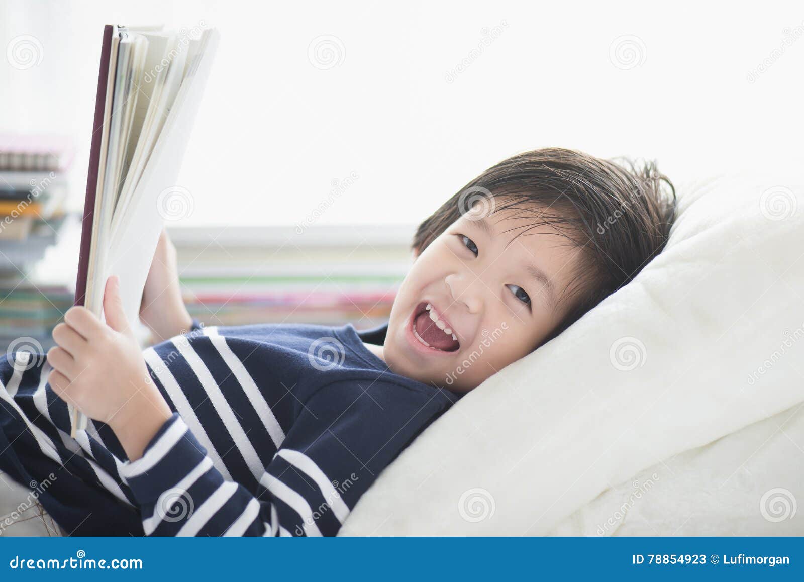 Asian child reading a book stock image. Image of child - 78854923