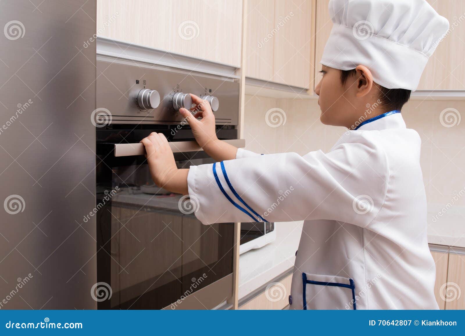 Asian Chinese Boy in White Chef Uniform Baking Cookies Stock Image ...