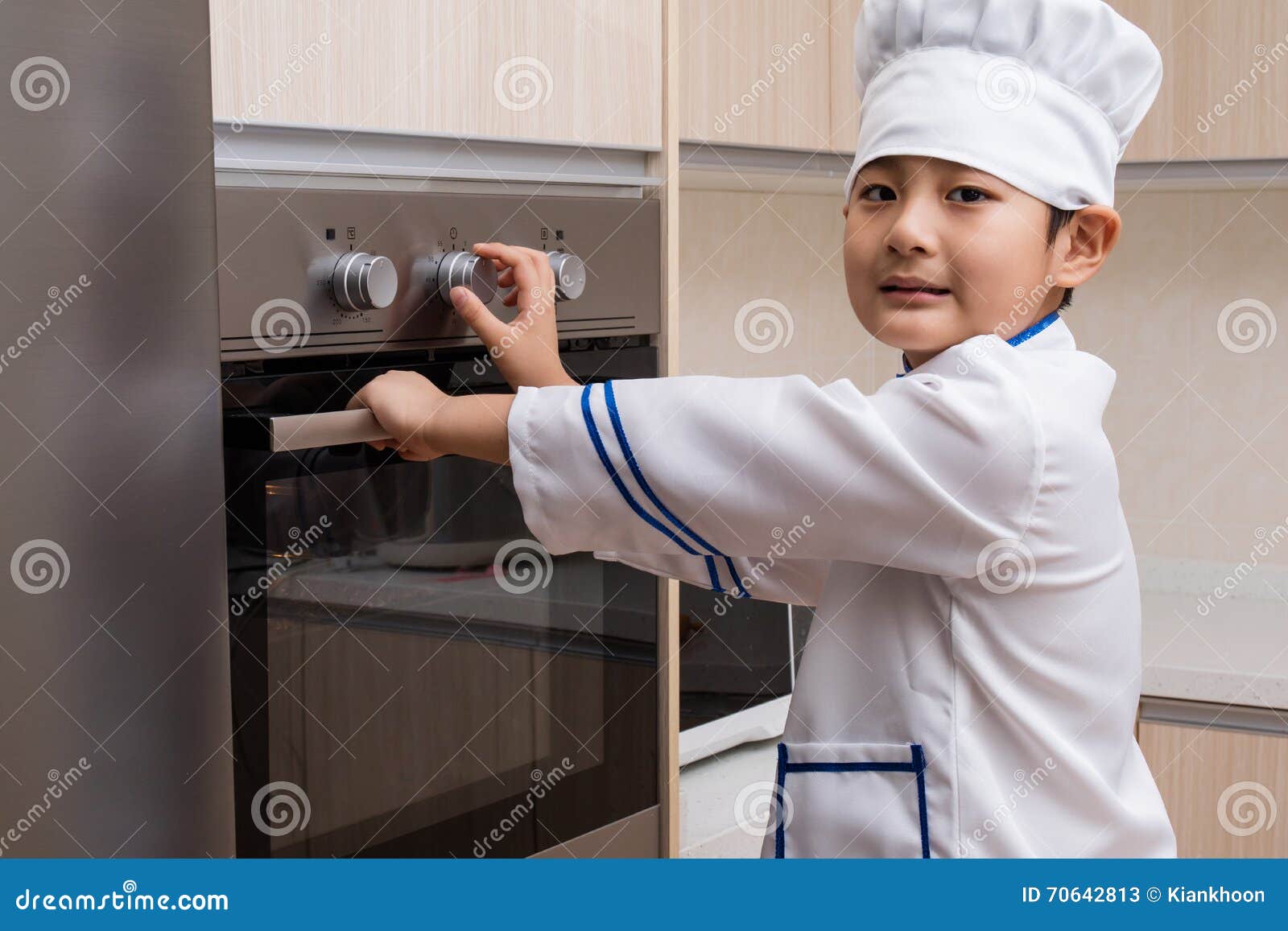 Asian Chinese Boy in White Chef Uniform Baking Cookies Stock Image ...