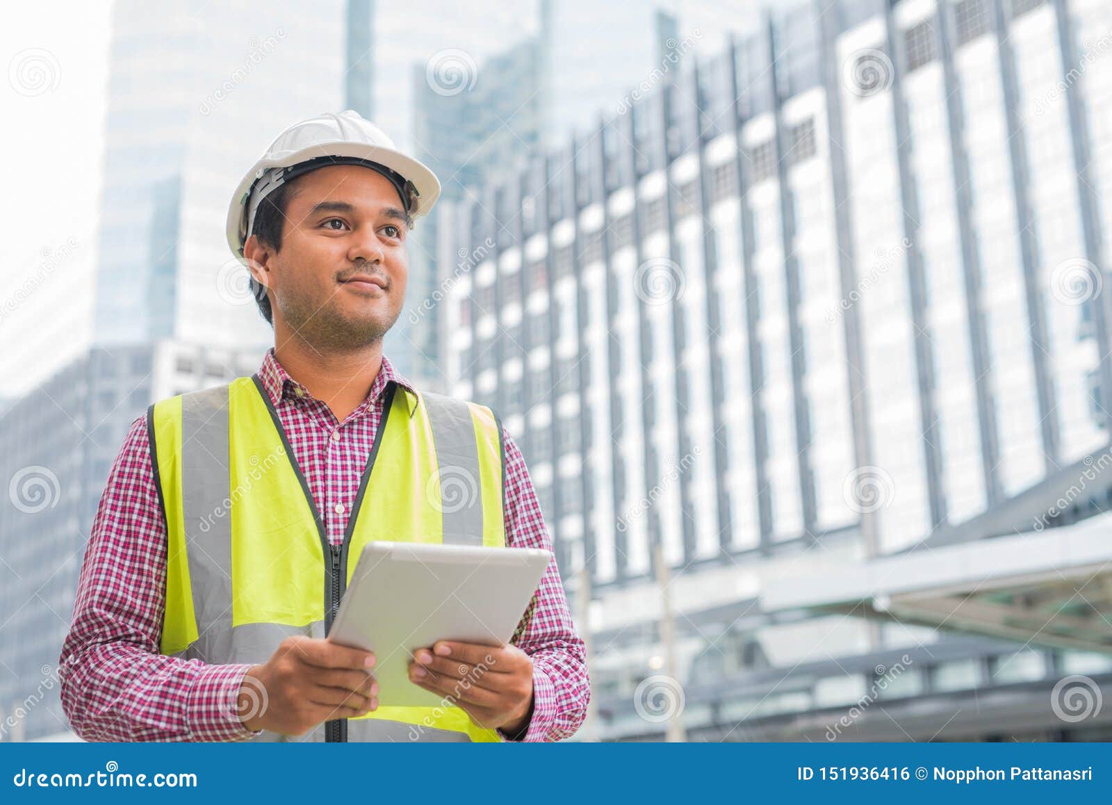 Asian Civil Engineer Working at Building Site. Stock Photo - Image of ...