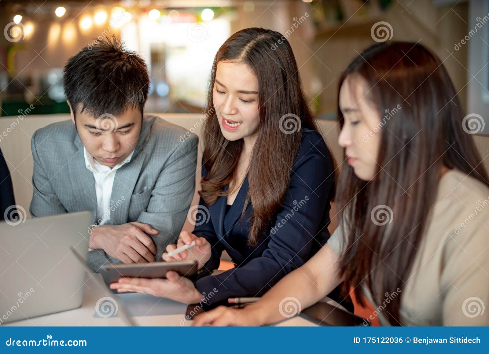 Asian Colleagues Discussing at Workplace Stock Photo - Image of ...