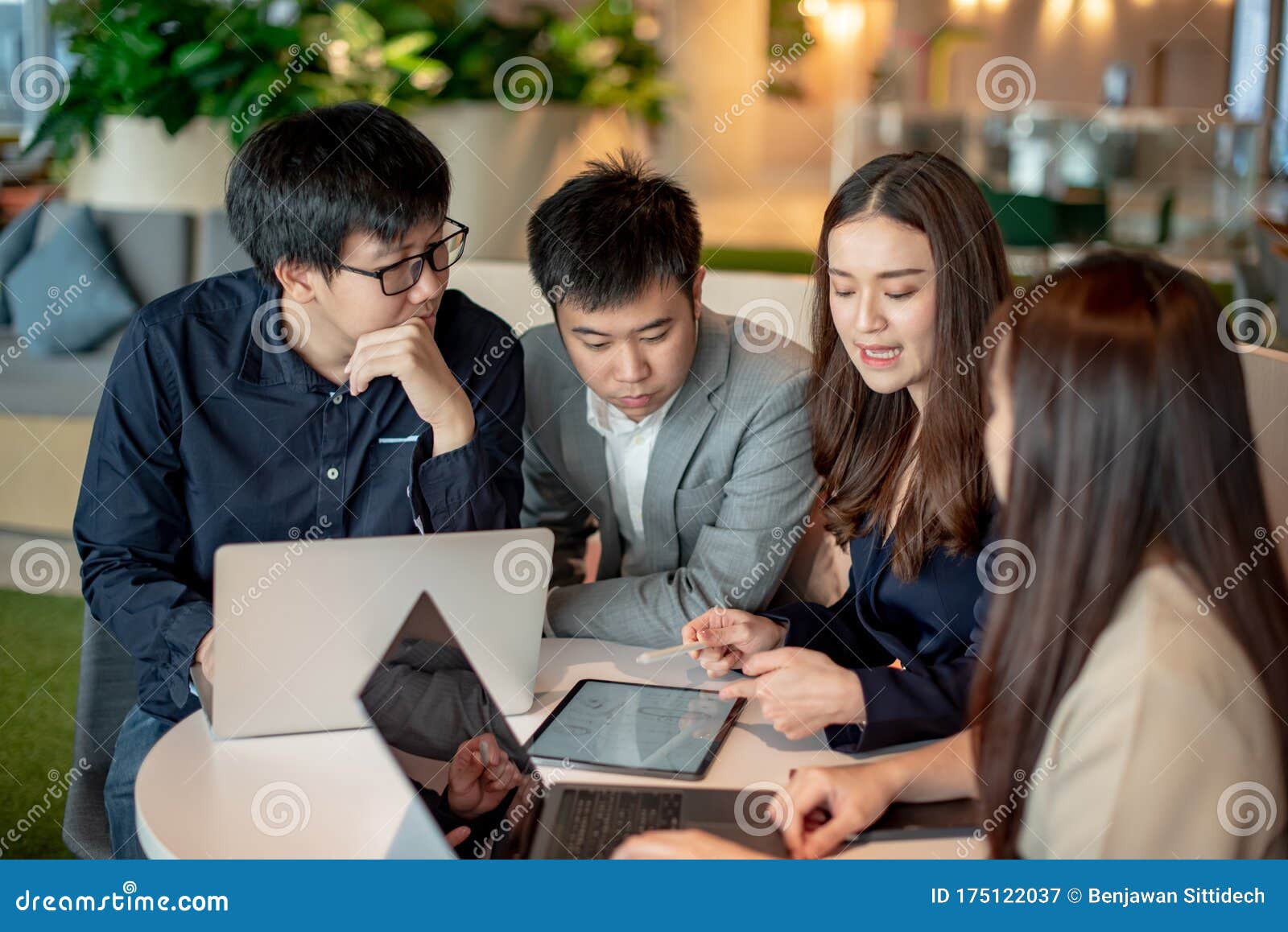 Asian Colleagues Discussing at Workplace Stock Image - Image of ...