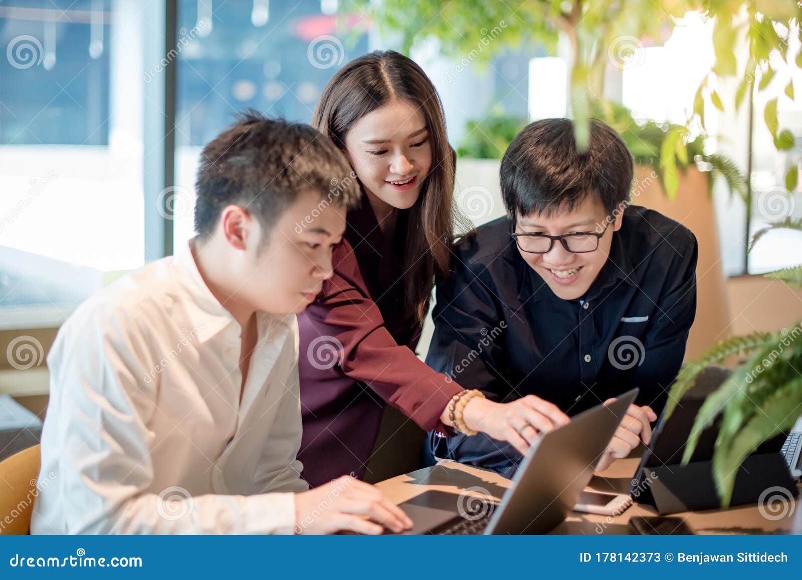 Asian Colleagues Discussing at Workplace Stock Image - Image of ...