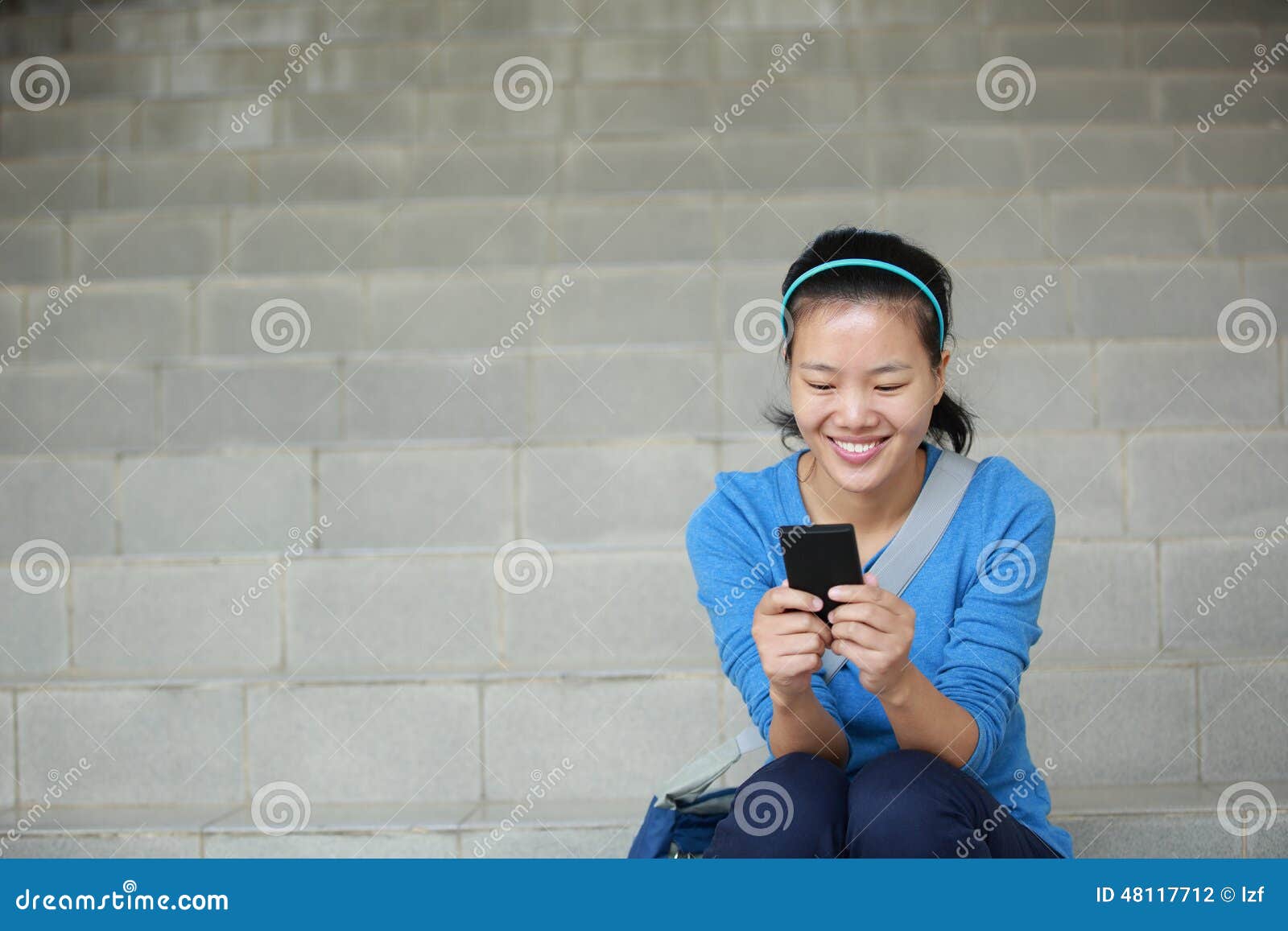 Asian College Student Using Smartphone Stock Photo - Image of message ...