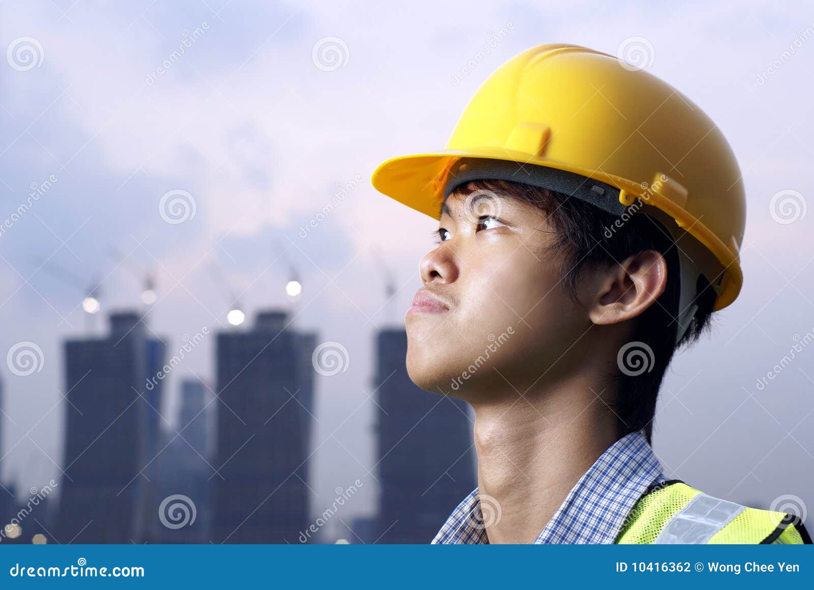 Asian Construction Workers Working On Scaffolding Of Building ...