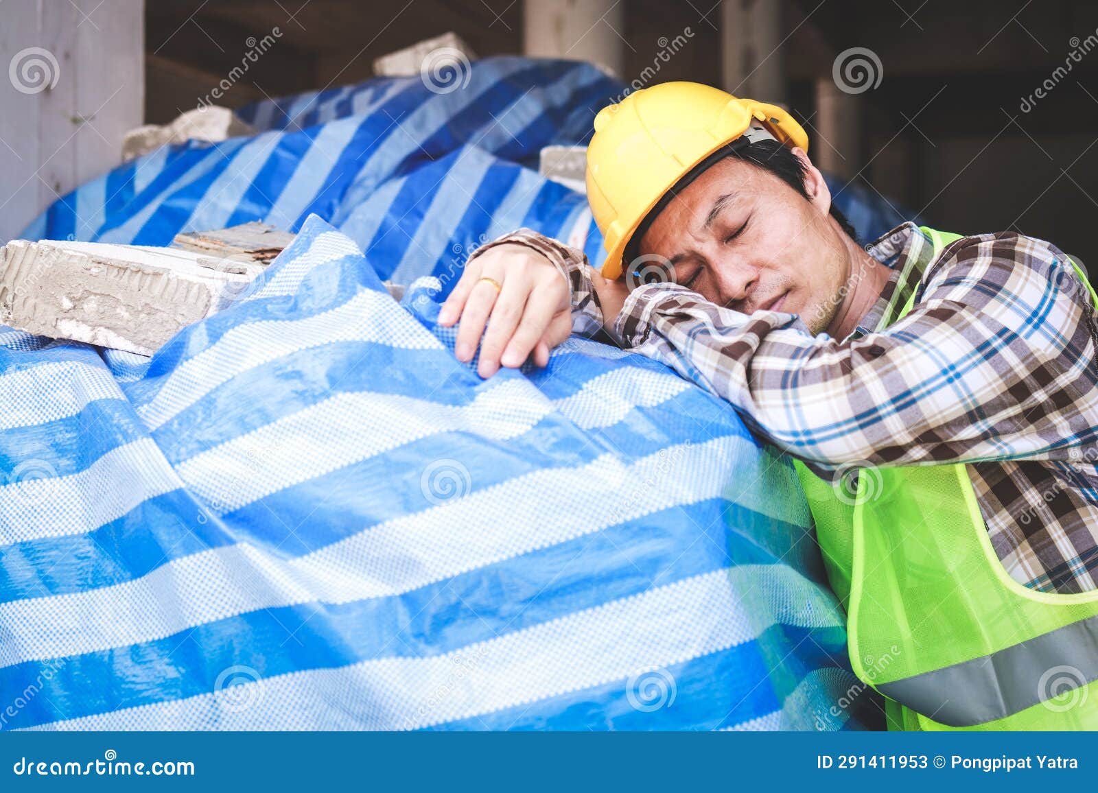 Asian Construction Worker Sleeping at Construction Site. Stock Image ...