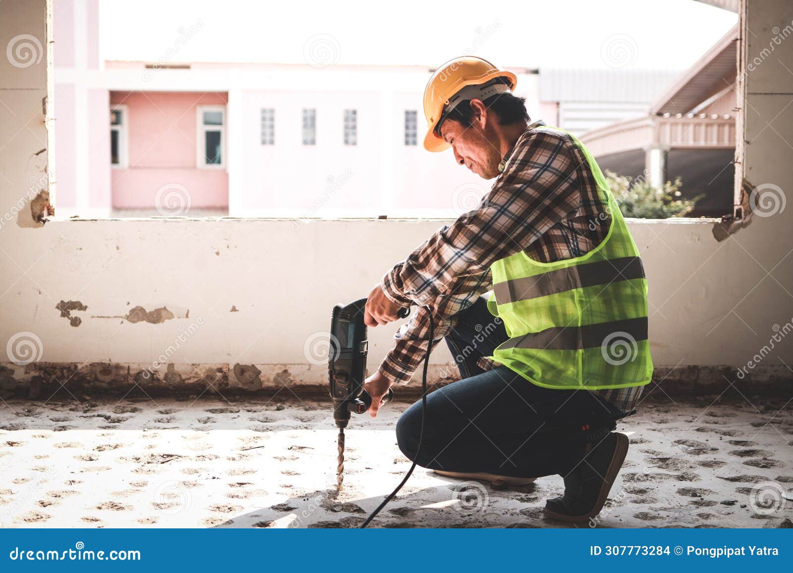 Asian Construction Worker Using Mortar Extraction Machine To Drill ...
