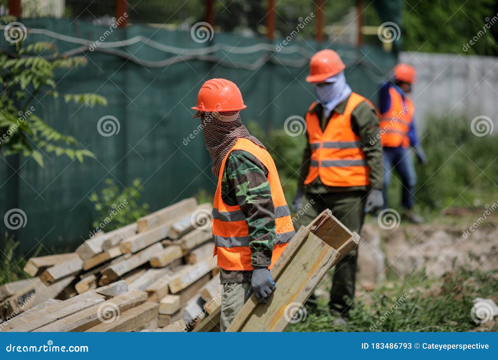 Asian Construction Workers on a Construction Site in Bucharest ...