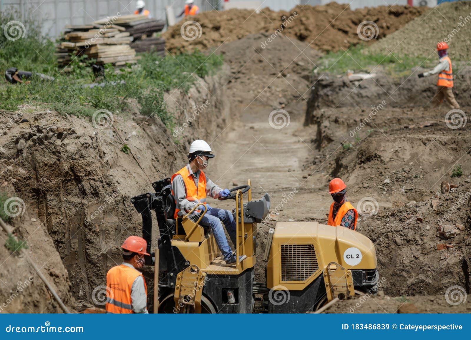 Asian Construction Workers on a Construction Site in Bucharest ...