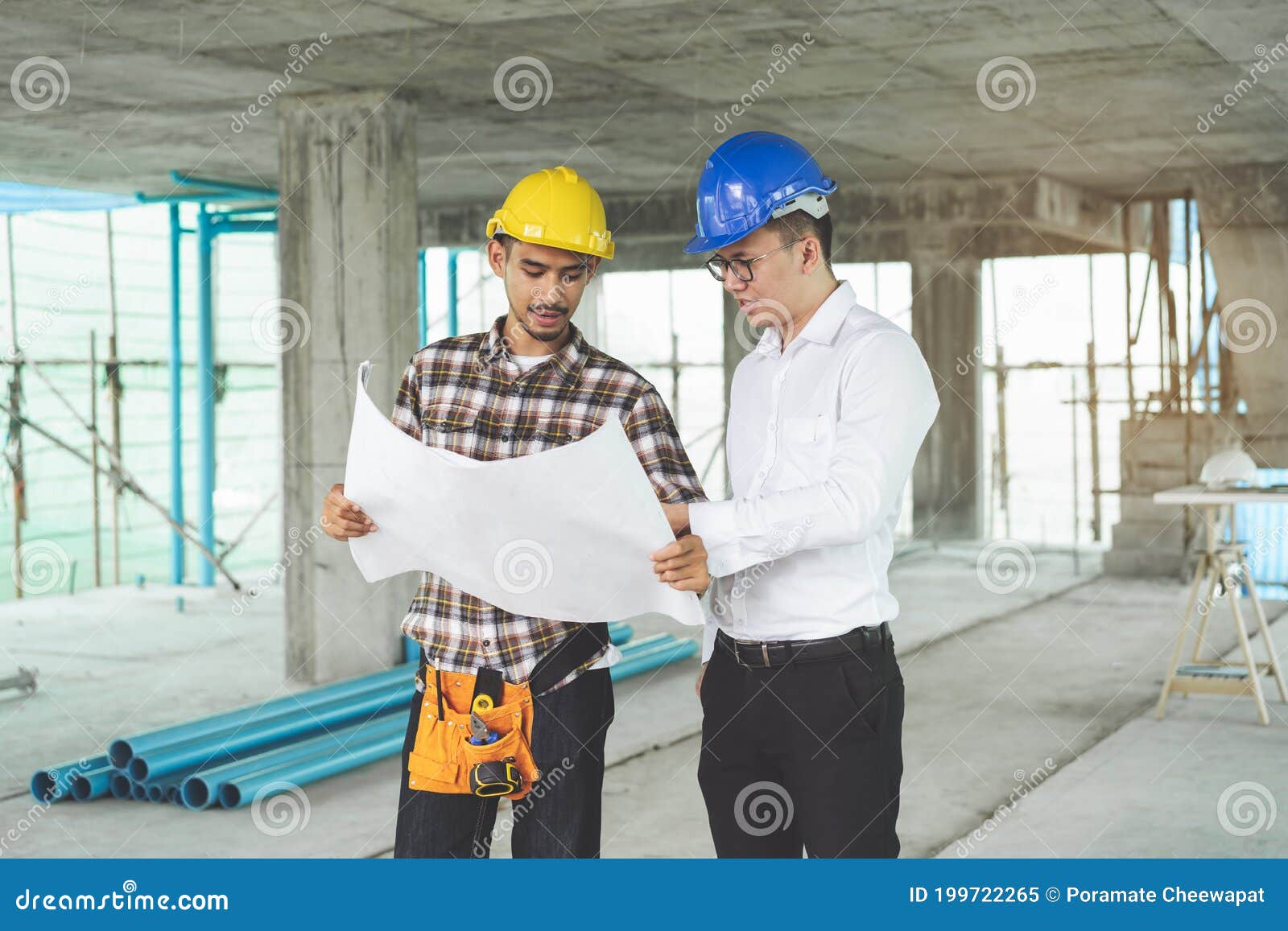 Contractor and Engineer Inspecting Material in Construction Building ...