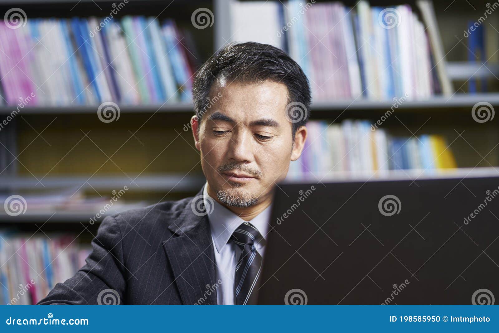 Asian Corporate Executive Working in Office Stock Photo - Image of busy ...