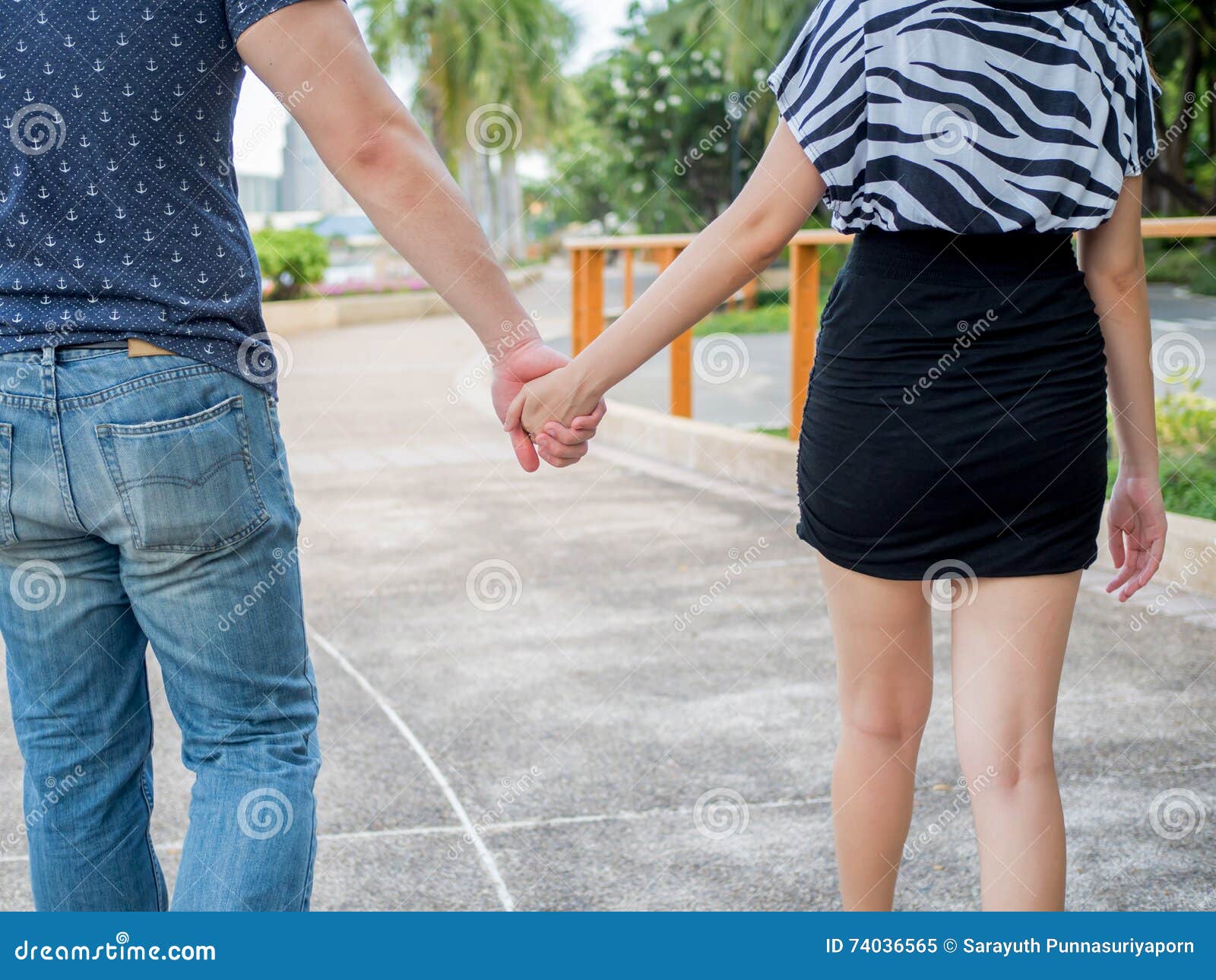 Asian Couple Holding Hands Walking In The Park Stock Image Image Of