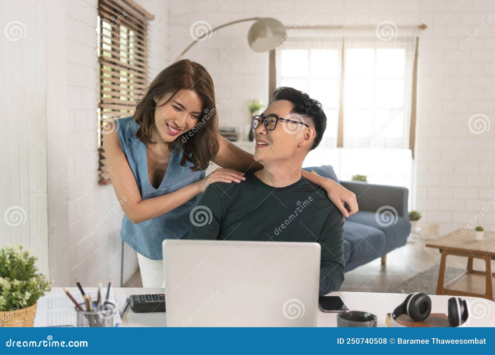 Asian Couple at Home Using Laptop Computer Stock Photo - Image of ...