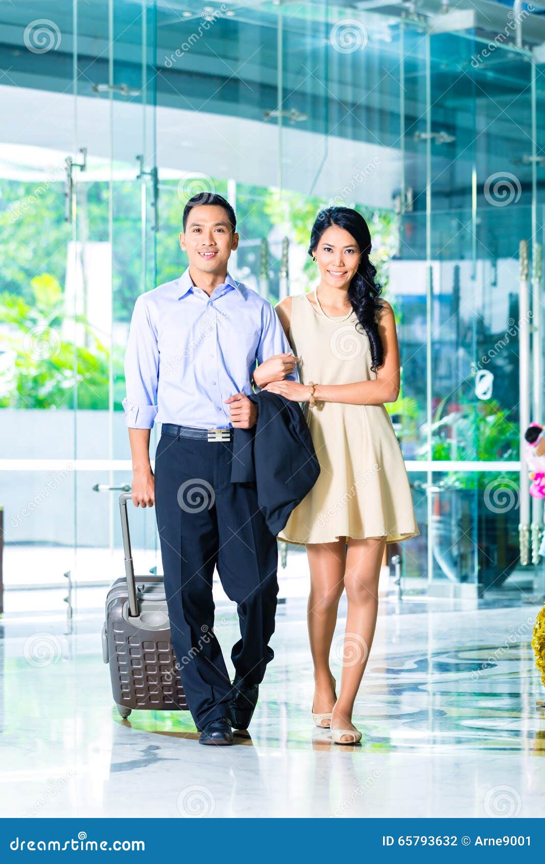 Asian Couple Walking in Hotel Lobby Stock Photo - Image of people, hall ...