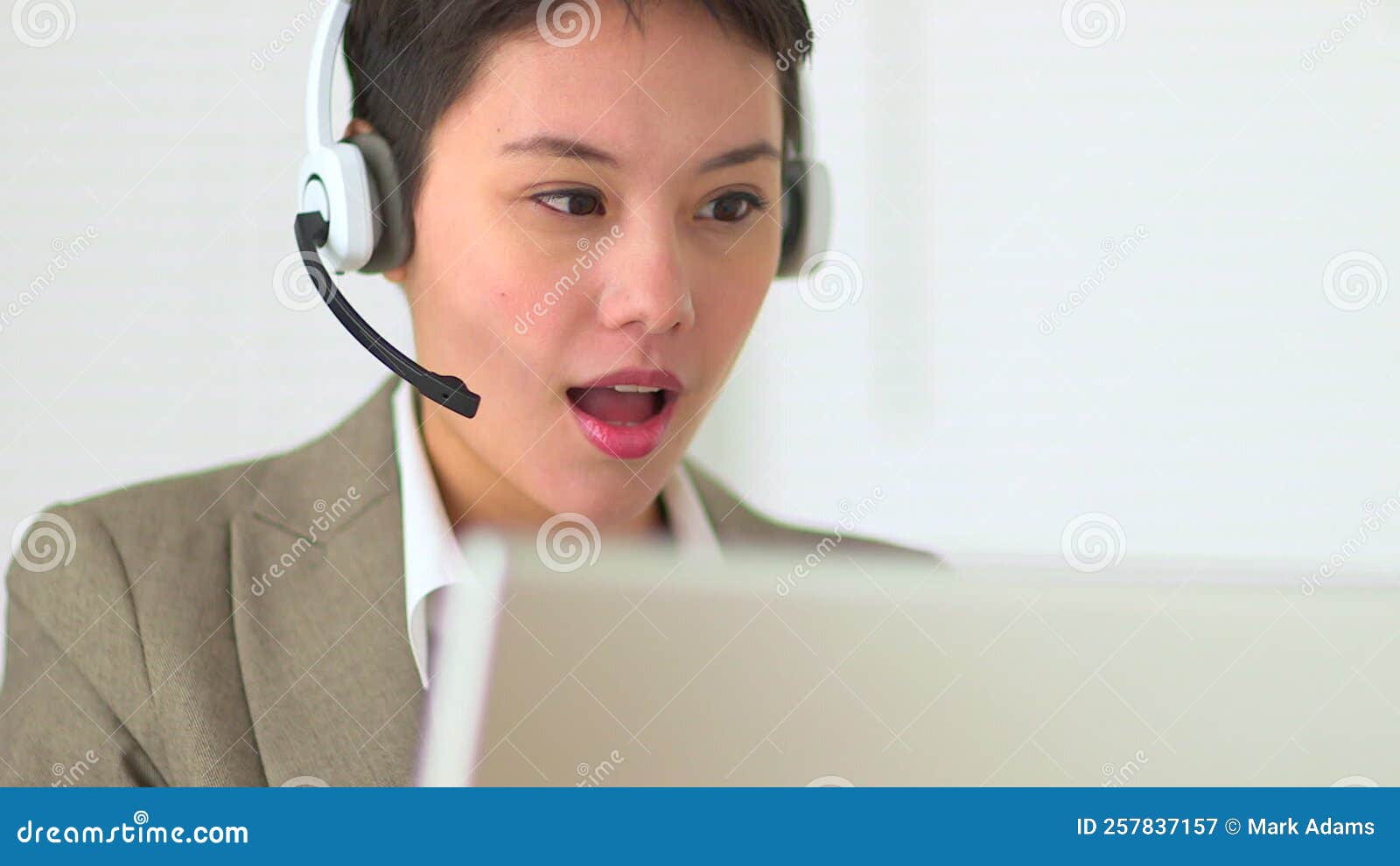Asian Customer Service Representative with Headset in Call Center Stock ...