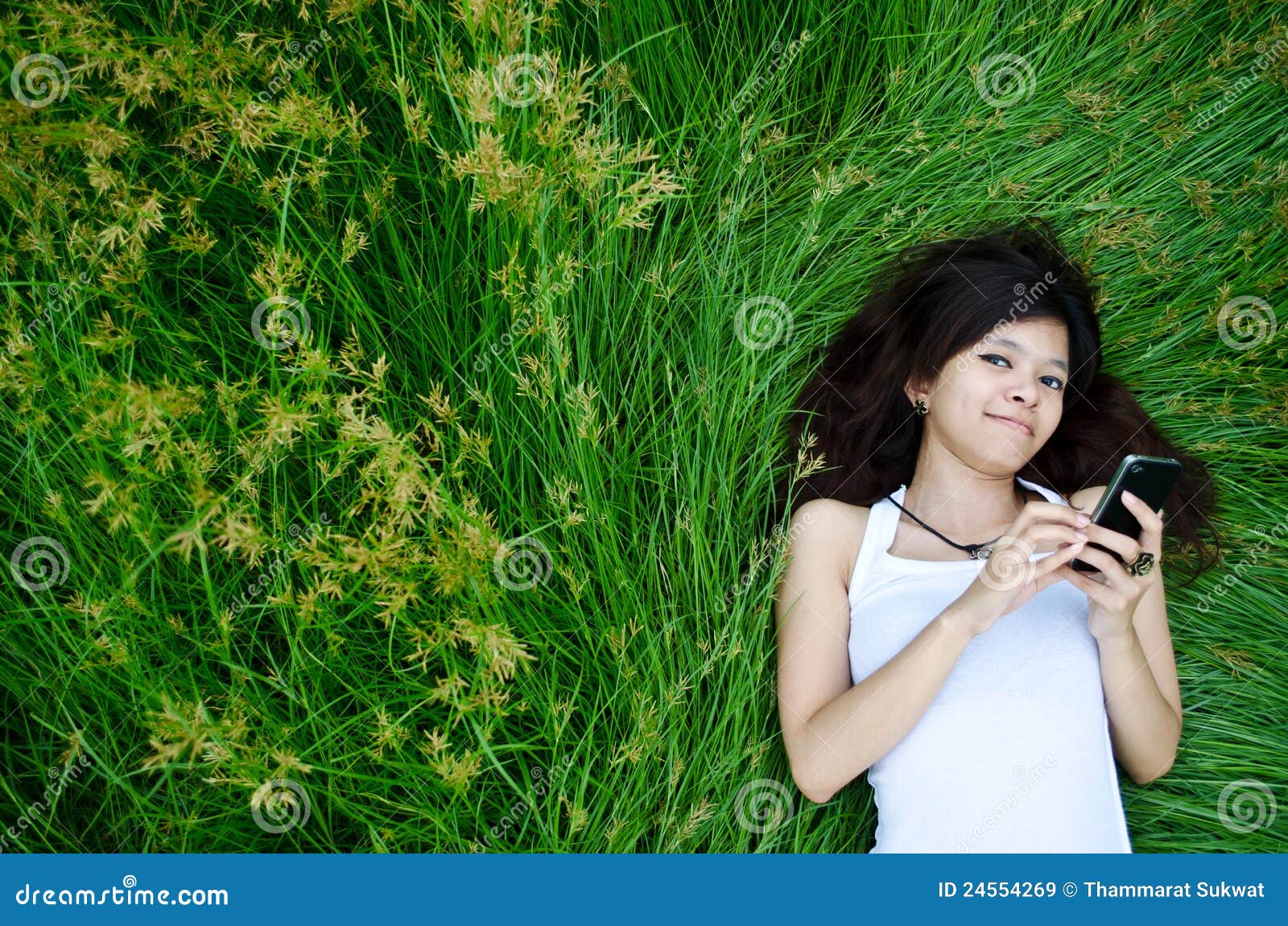 Asian Cute Girl Texting on Meadow Stock Image - Image of cheerful ...