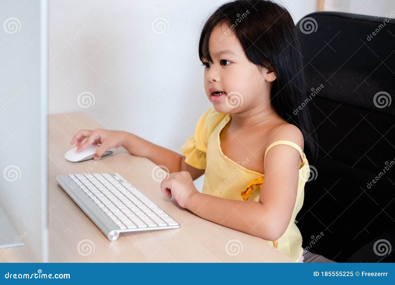 Asian Cute and Happy Little Girl Children Using Computer, Studying ...