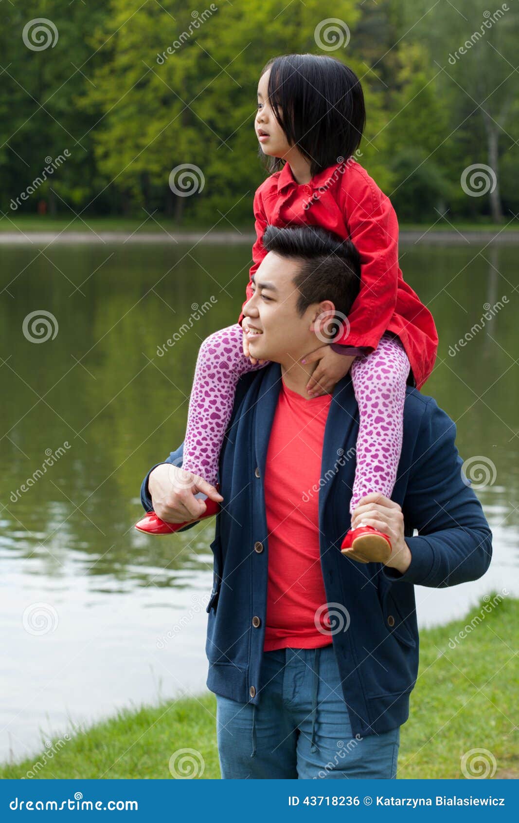 Asian Dad with Adorable Daughter Stock Photo - Image of play, green ...