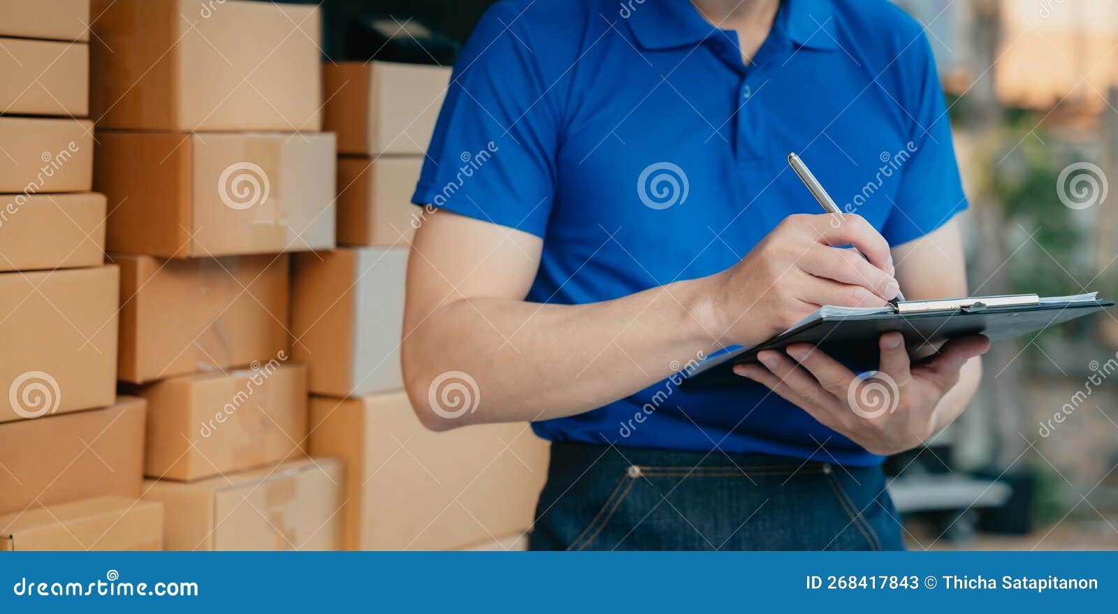 Asian Delivery Man in Cargo Van Checking Boxes Stock Image - Image of ...