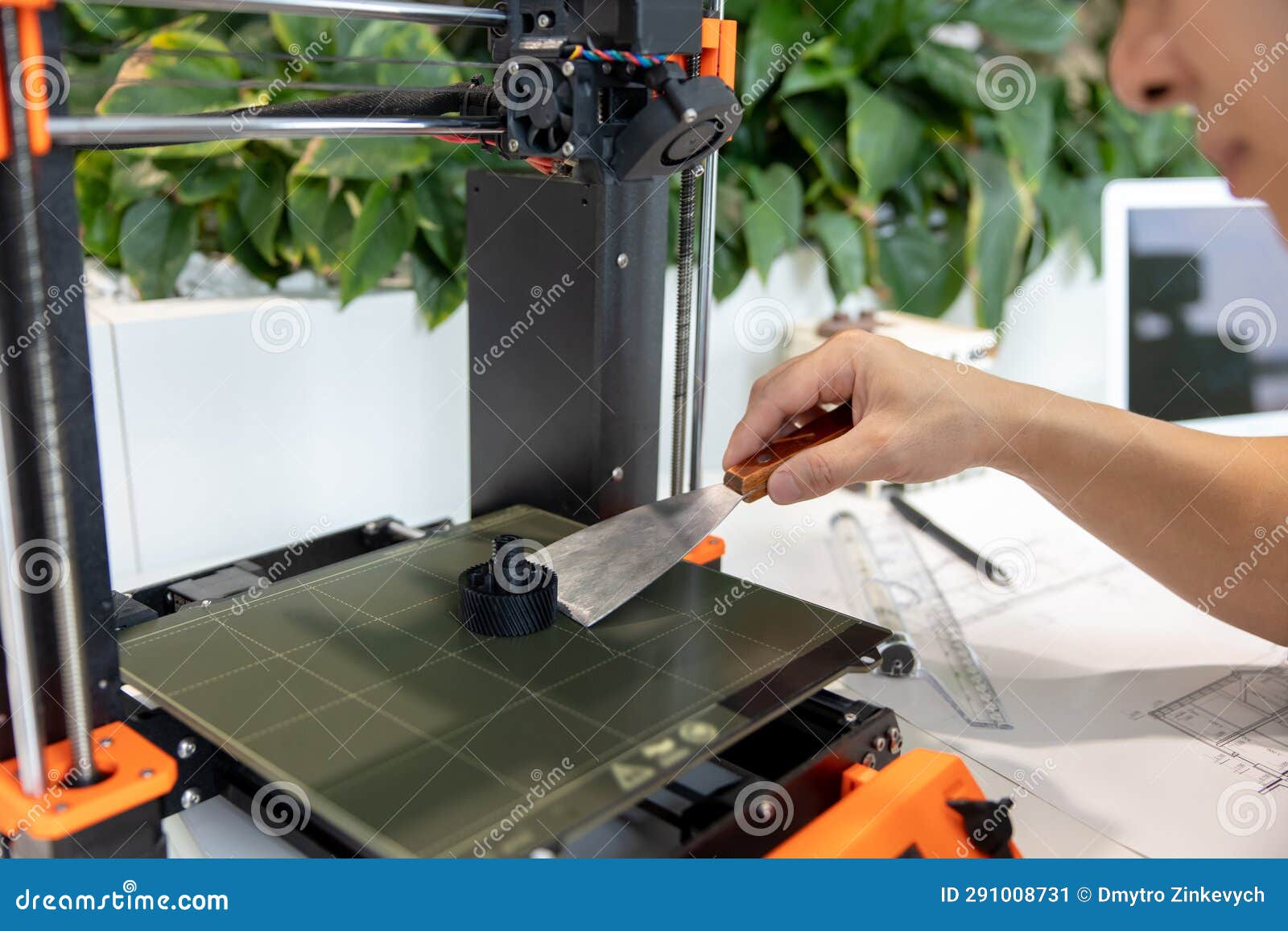 Asian Designer Engineer Using 3D Printer in Laboratory and Studying ...