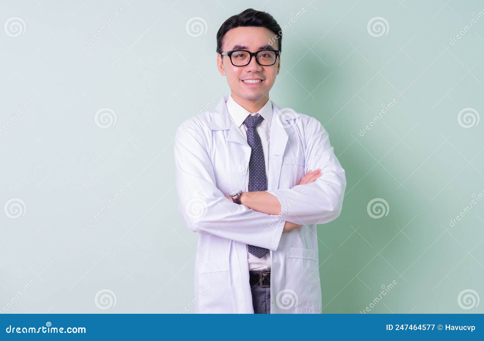 Asian Doctor Standing on Green Background Stock Image - Image of ...