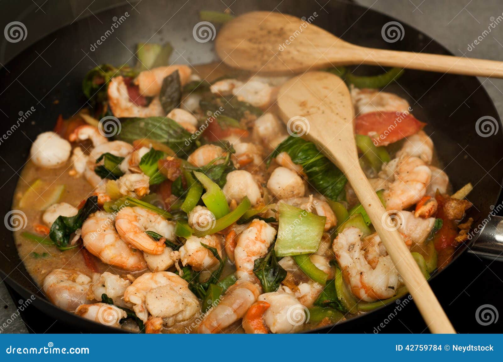 Asian eating with wok stock photo. Image of basil, tomato - 42759784
