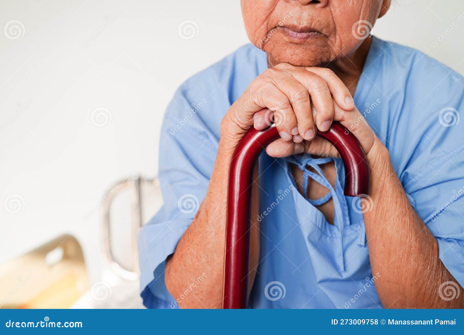 Asian Elderly Disability Woman Patient Holding Walking Stick In