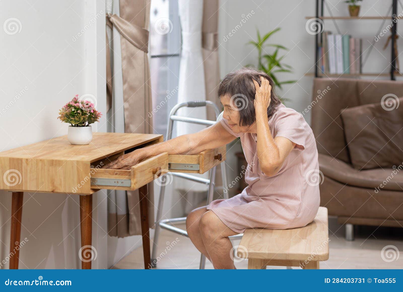 Asian Elderly Woman Looking for Something that she Forgot it in Drawers ...