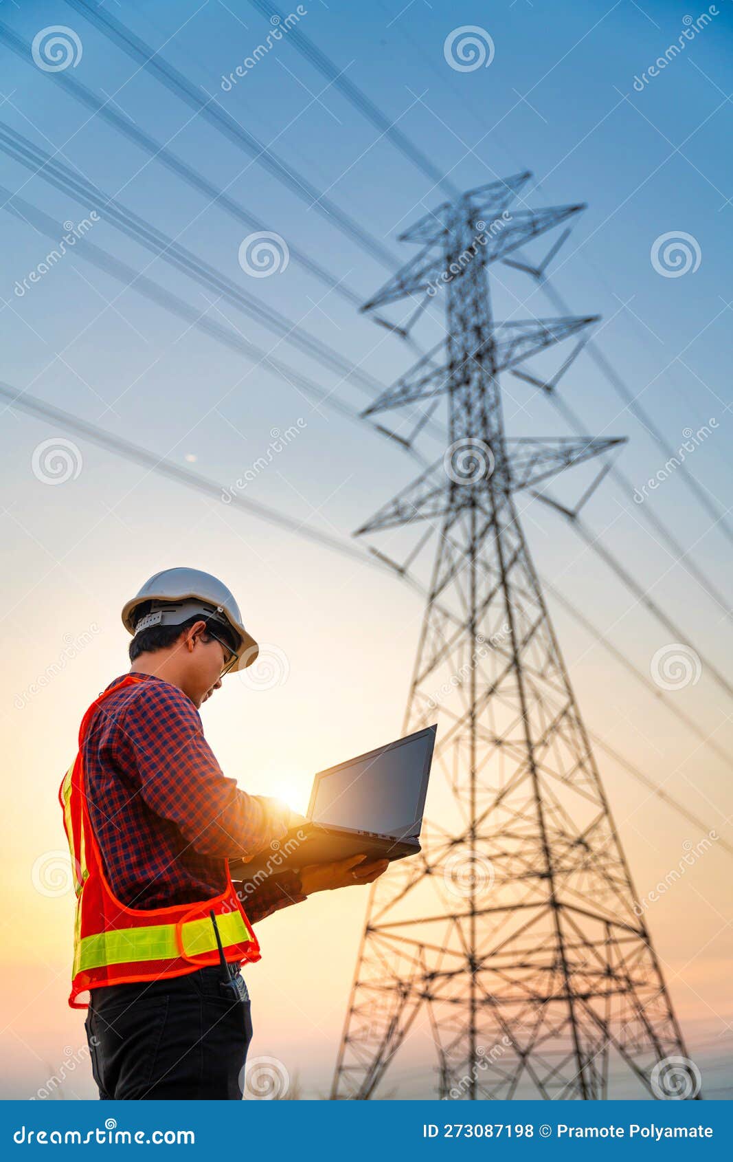 Asian Electrical Engineer Checking Position Using Notebook Computer at ...
