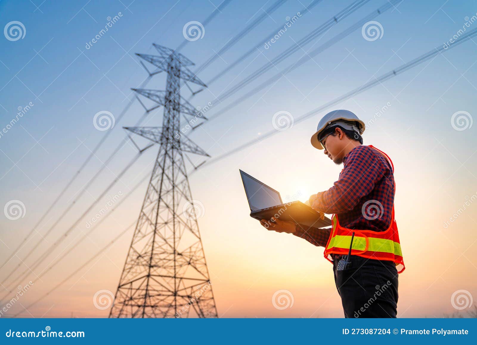 Asian Electrical Engineer Checking Position Using Notebook Computer at ...