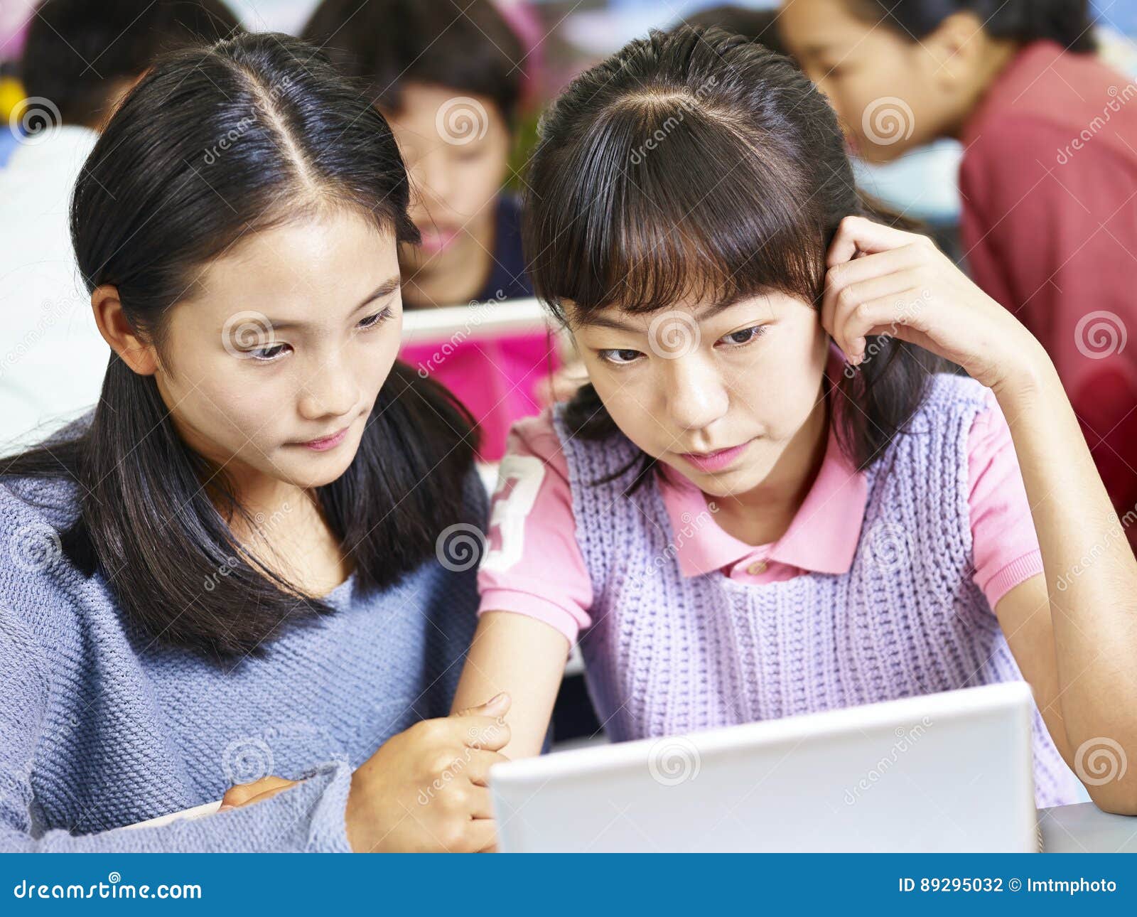 Asian Elementary School Students Working in Groups Stock Photo - Image ...