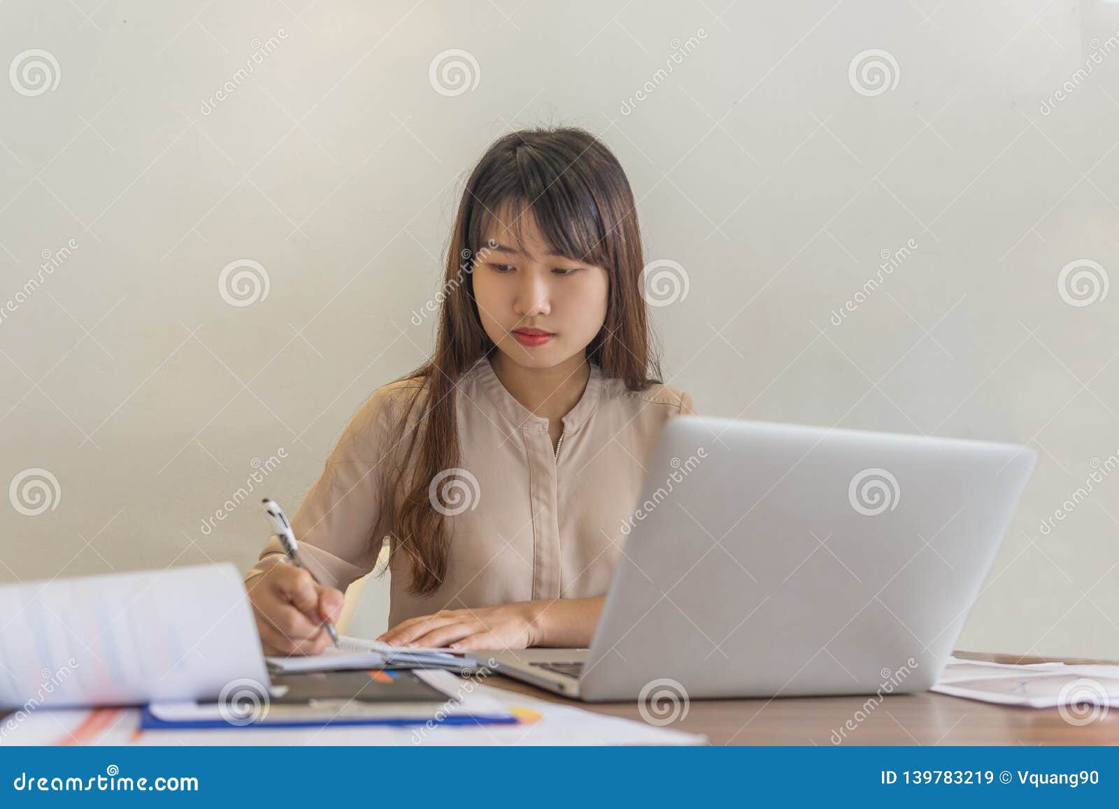 Asian Employee Writing Notes in Office Room Stock Image - Image of ...