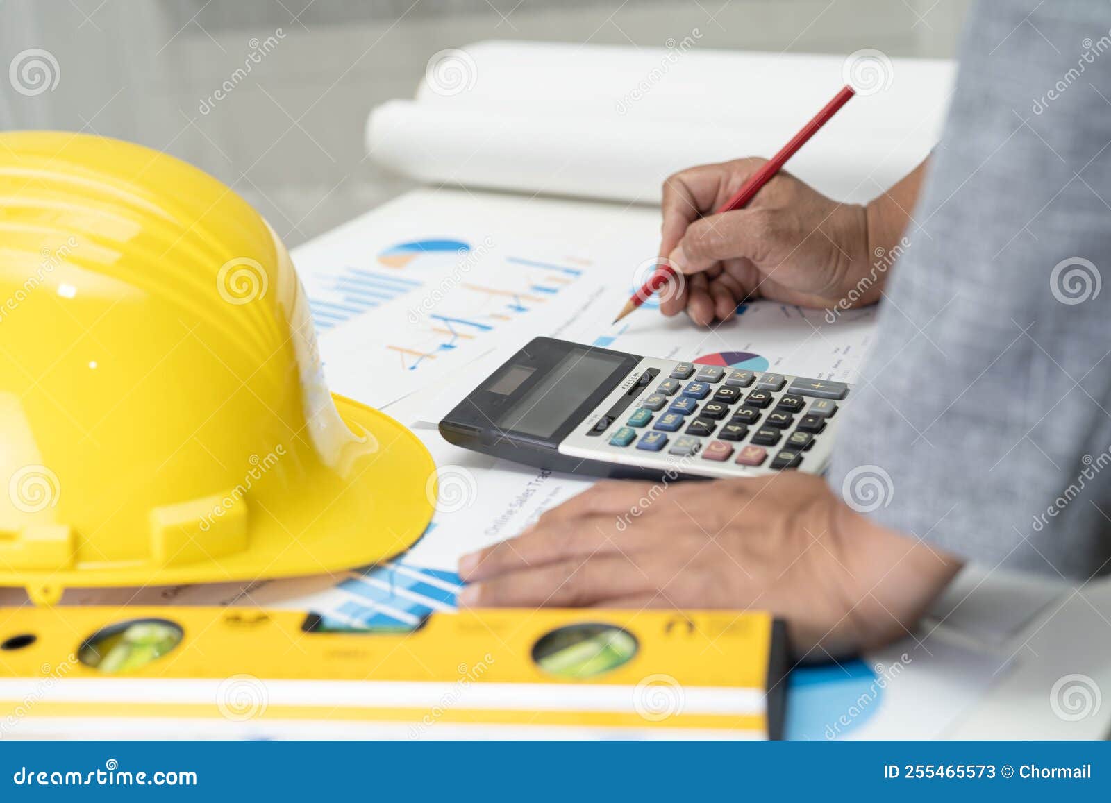 Asian Engineer with Architectural House Plan Project Blueprint, Graph ...