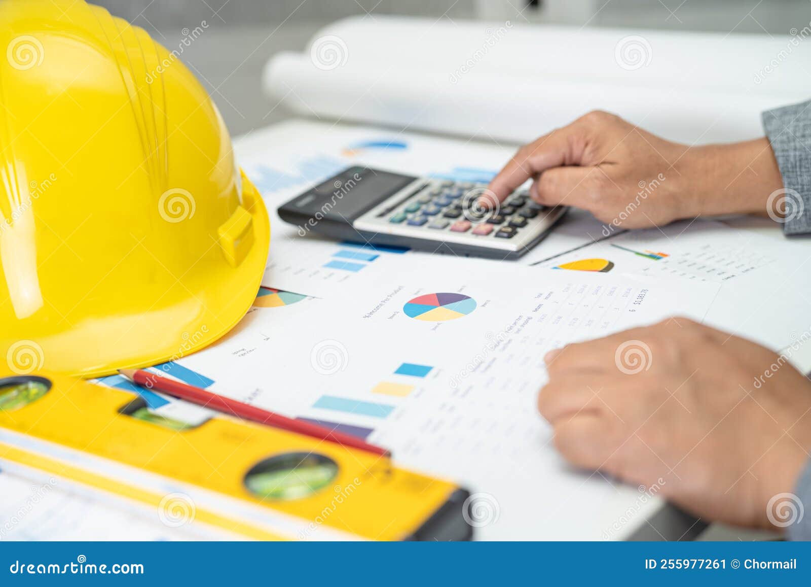 Asian Engineer with Architectural House Plan Project Blueprint, Graph ...