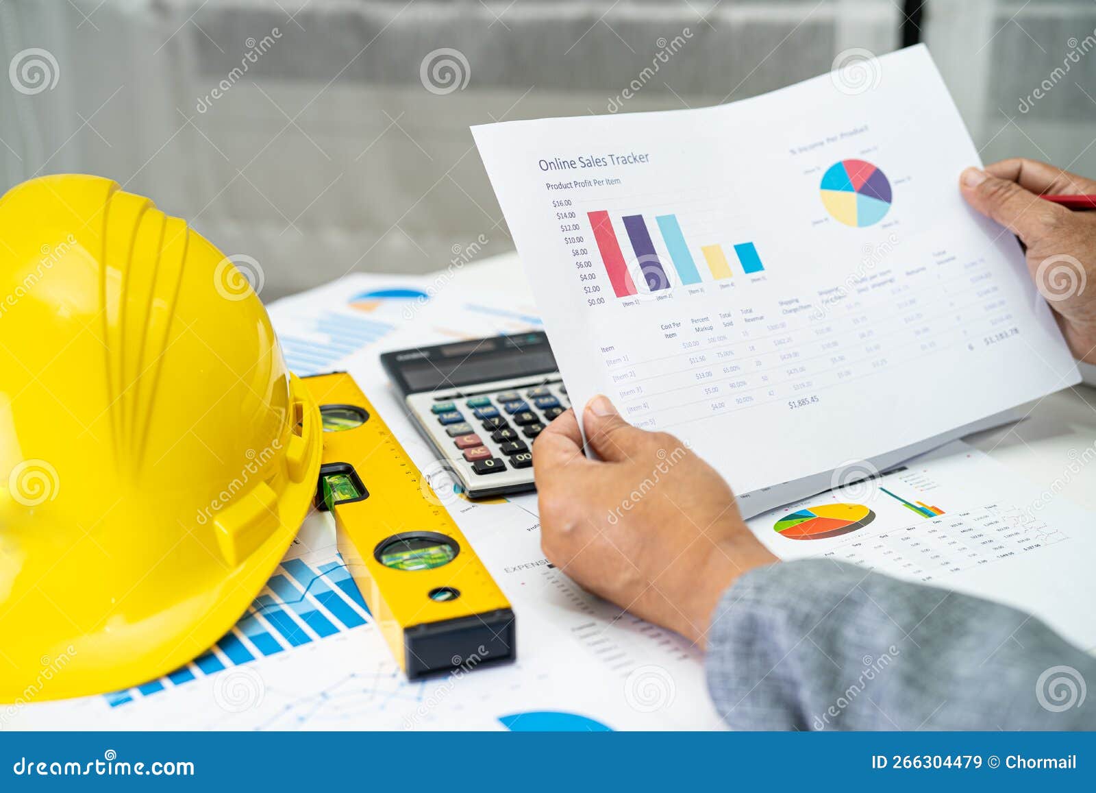 Asian Engineer with Architectural House Plan Project Blueprint, Graph ...